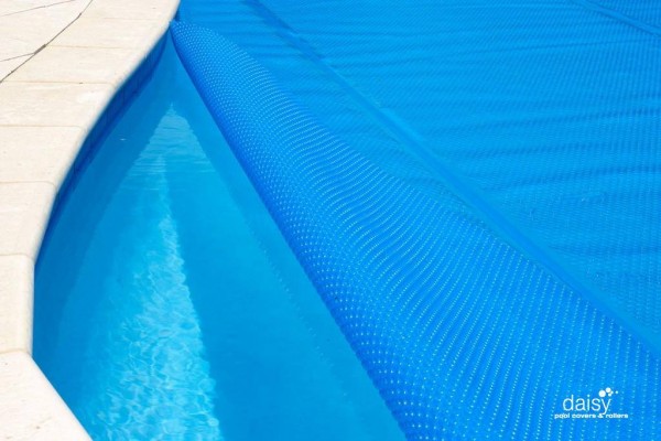 How to install and trim a solar pool blanket | Solazone ...